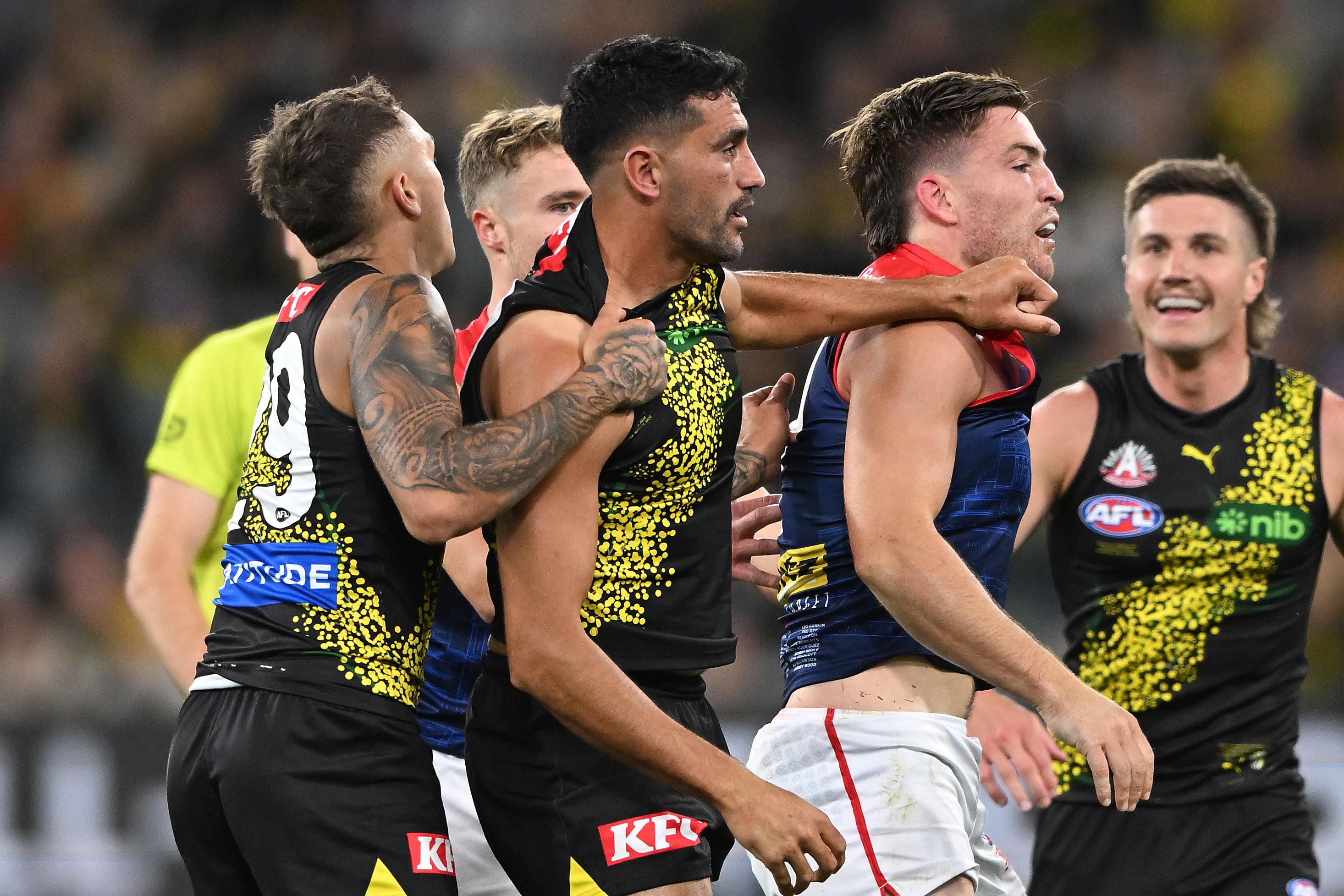 Tempers flare after rib tickler in tightly fought A... | National ...