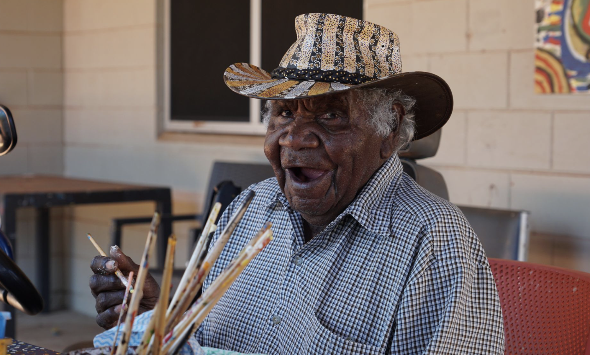 Yankunytjatjara man Reggie Uluru presents his fir... | National ...